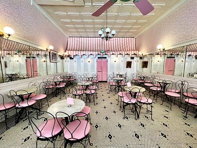 Pink chairs invite you to linger in a room where calories don't count. The black and white tile floor has witnessed countless first dates and family celebrations.