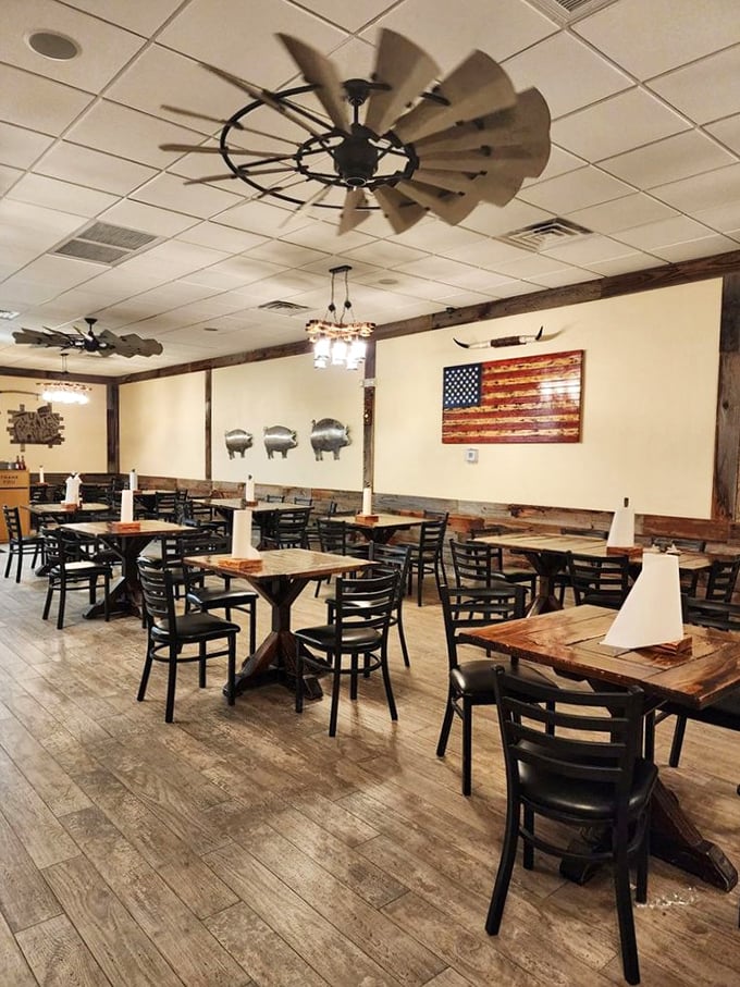 A dining room that says, "Stay awhile, we've got stories to tell." Those windmill ceiling fans aren't just moving air—they're stirring anticipation.