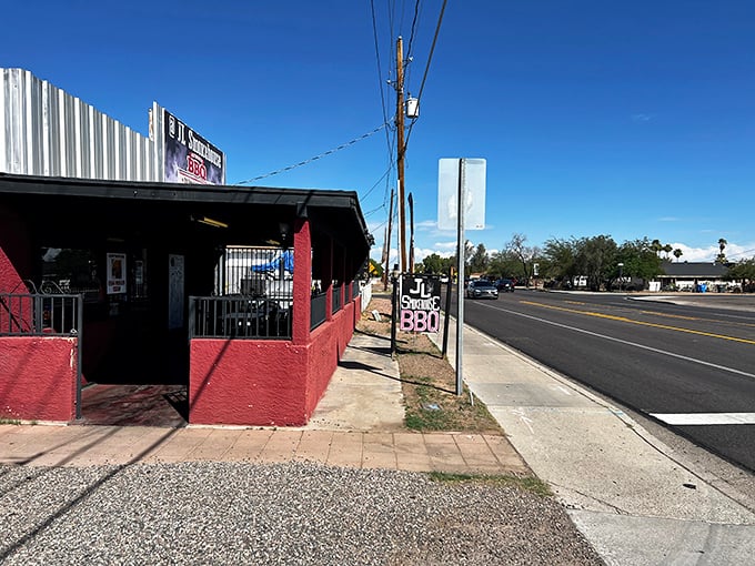 Red barn vibes meet serious BBQ business - this is where authentic flavors call home.