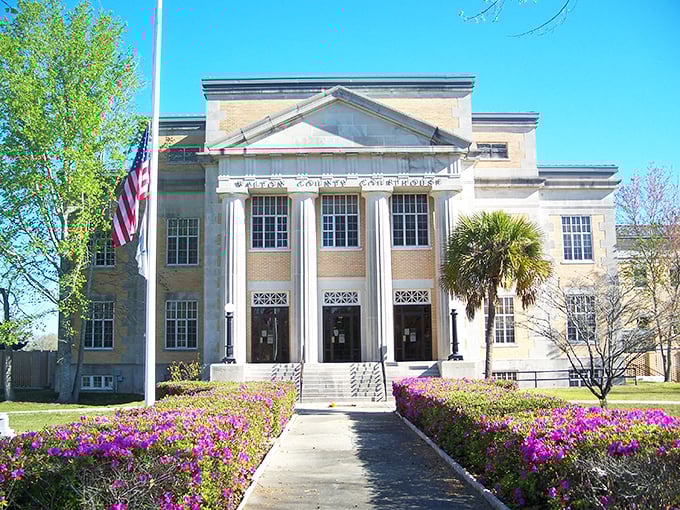 The courthouse commands attention with its classical columns, a reminder of when public buildings were architectural statements.