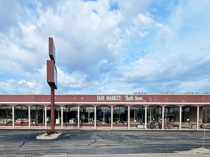 Fair Market's distinctive red colonnade stretches invitingly—like a runway leading to secondhand surprises.