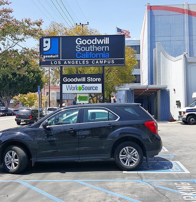 The Goodwill campus sign announces more than shopping – it's a community hub where bargains meet job training.