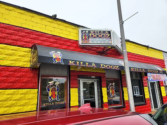 Killa Dogz's bold yellow and red exterior is like a hot dog carnival that promises flavor adventures not for the faint of heart.