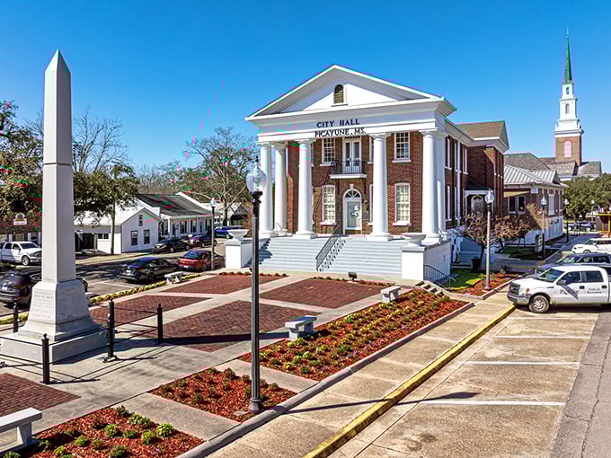 Classic courthouse architecture anchors communities where civic pride shows in every carefully maintained detail and flower.