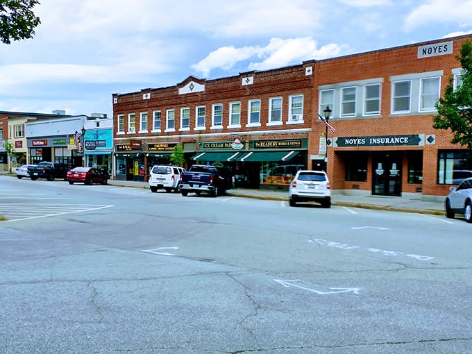 Plymouth's distinctive red building with white awnings stands as a cheerful landmark in a town where college-town energy meets budget-friendly prices. 
