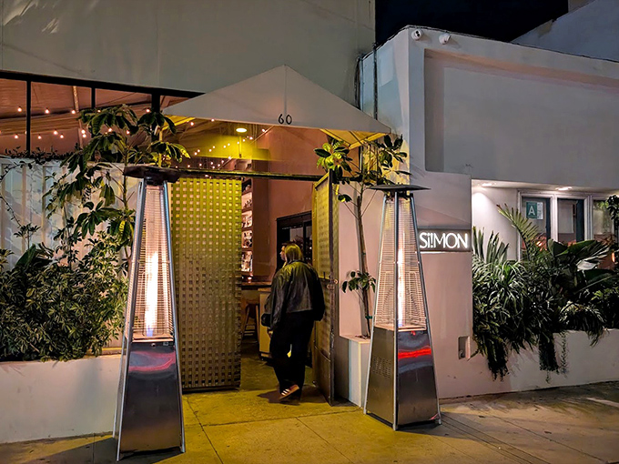 Behind that understated entrance lies culinary magic - Venice's best-kept secret hiding in plain sight for lucky diners.