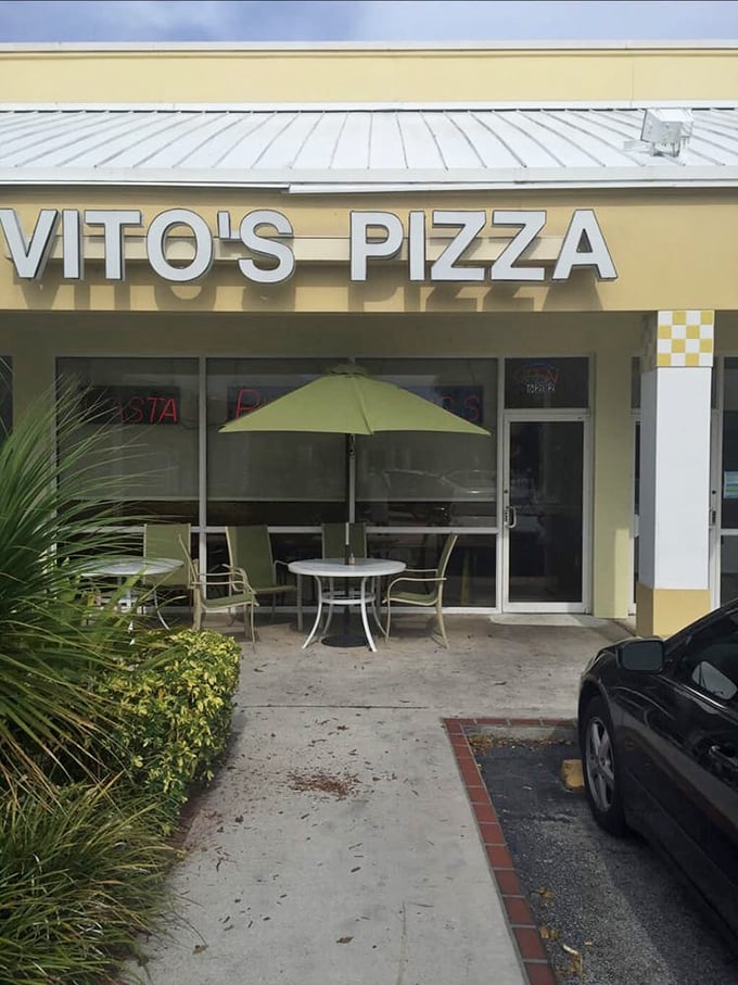 Vito's cheerful yellow exterior brightens up Fort Lauderdale's pizza scene. Sunshine and slices—Florida's perfect combination!