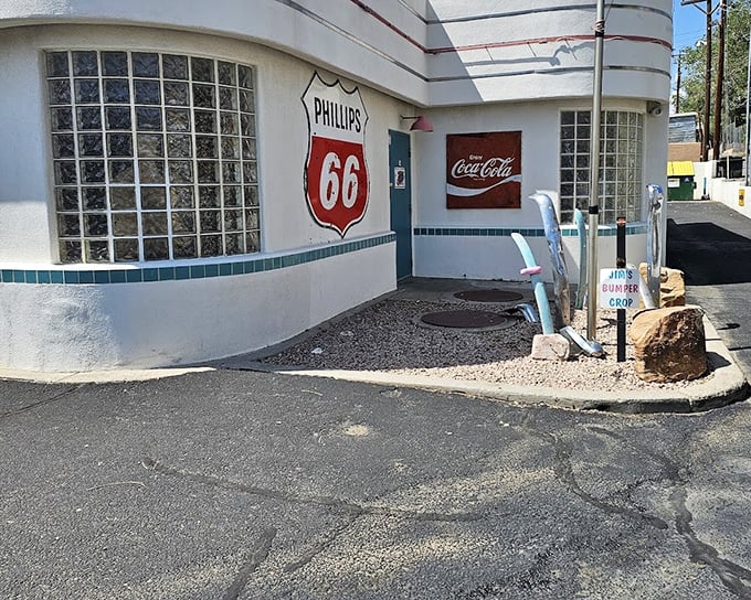 Turquoise trim and Coca-Cola signs—this diner hasn't just preserved history, it's still living it with every burger served.