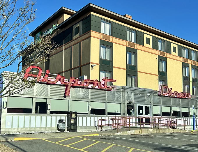Nestled beside a hotel, the Airport Diner stands ready to welcome travelers with the comfort food equivalent of a warm hug.