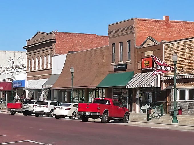 Classic brick storefronts house modern businesses, proving that some things improve beautifully with age and community care.