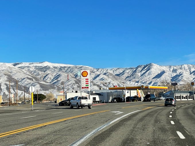 The dramatic Sierra Nevada mountains create a stunning backdrop for Bishop's main highway and local Shell station.