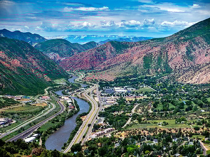 The view from above reveals how perfectly this mountain town fits into its river valley home.