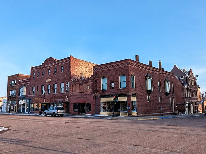 Prairie town charm radiates from every building like warmth from a well-tended fireplace on winter nights.