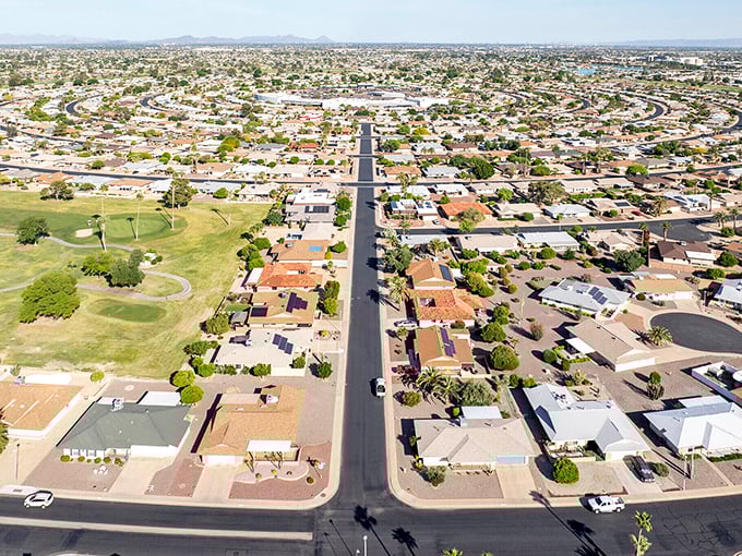 From above, Sun City’s tidy streets and golf-course greens reveal retirement living planned with geometric precision—where even leisure follows a blueprint.