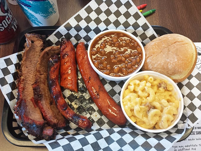 The two-meat plate—where decision anxiety transforms into the relief of not having to choose between BBQ favorites. Those beans mean business. 