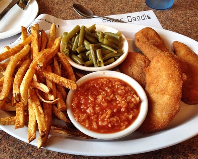 The perfect harmony of crispy tenders, tangy hot sauce, fresh coleslaw, and hand-cut fries – a plate that makes you wonder why you'd ever eat anywhere else.
