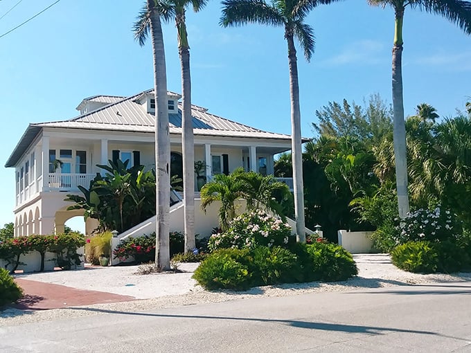 Island architecture at its finest—elevated living with wraparound porches designed for sunset cocktails and morning coffee with pelican flyovers.