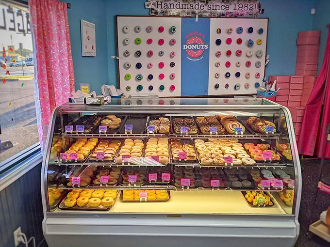 The display case: where donut dreams come true and diet plans go to die. Worth every delicious calorie and momentary guilt.