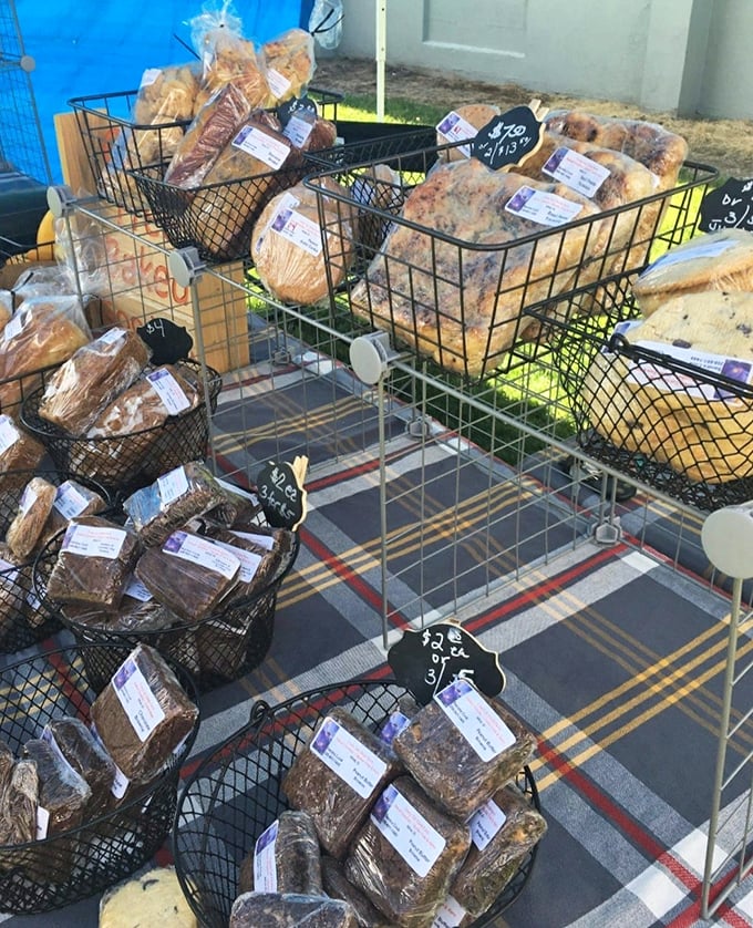 Homemade breads and baked goods nestled in wire baskets—carbohydrate heaven that makes grocery store bakeries seem like sad imposters.