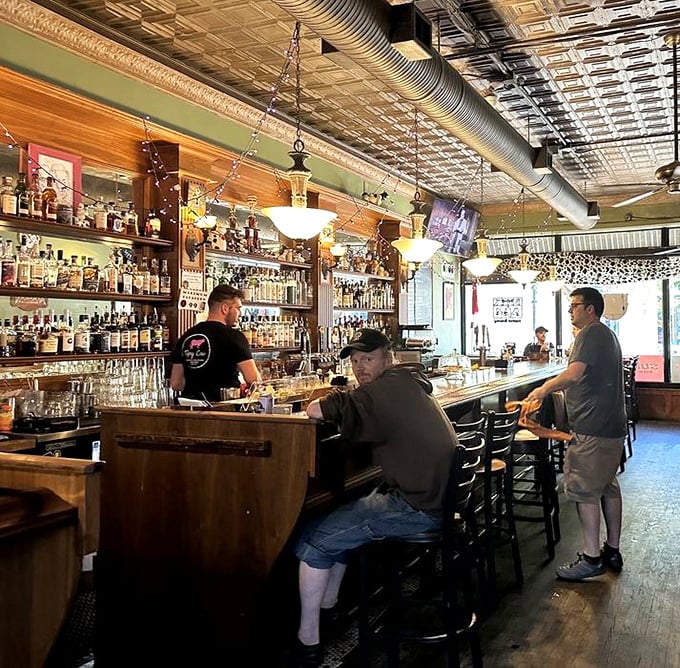 A bar stocked like a library of liquid happiness, with bartenders who double as storytellers and occasional therapists.