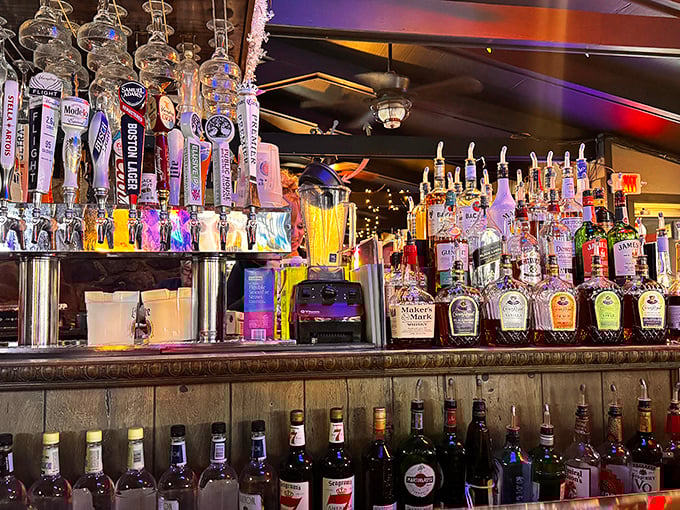 The bar isn't just stocked—it's prepared for any beverage emergency with an arsenal of spirits that would make a prohibition agent weep.