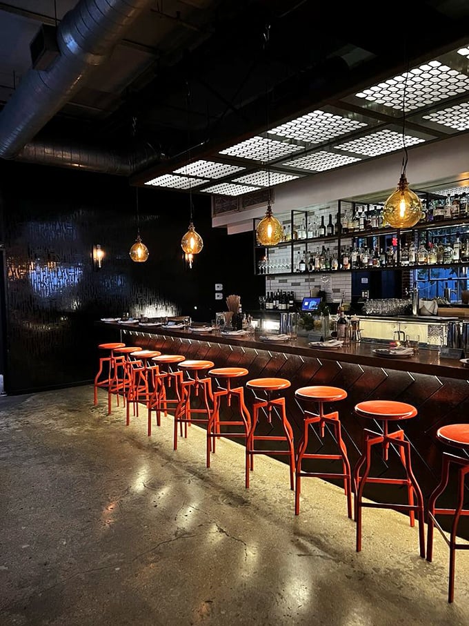 The bar at Bestia—where industrial meets intimacy. Those orange stools are like beacons calling you to sit and sip something spectacular.