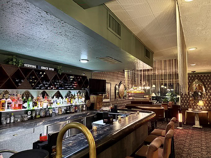 The bar's wine rack stands ready for duty—because what's an Italian feast without the perfect glass of vino?