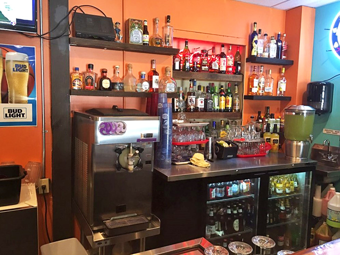 The bar area boasts enough spirits to lift yours. That margarita machine isn't just equipment—it's a happiness generator working overtime.
