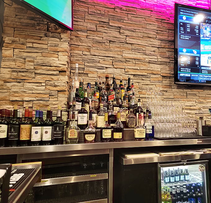 The well-stocked bar promises libations to complement your seafood feast. Those stone walls aren't just for show—they're holding back a tide of premium spirits.