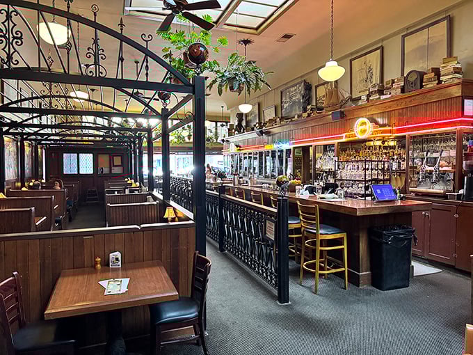 The bar isn't just where drinks are made; it's where conversations start, friendships form, and Olympia's day transitions to evening.