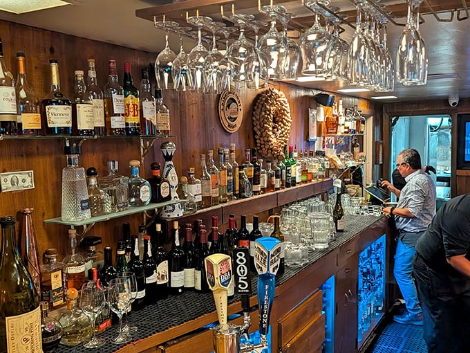 Behind every great steakhouse is a great bar, where glasses hang like crystal stalactites waiting to be filled with local vintages.