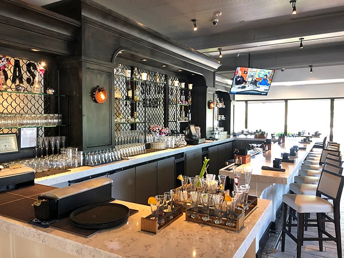 The bar area gleams with promise and possibility. Those perfectly arranged glasses stand ready for whatever brunch-time libation your heart desires.