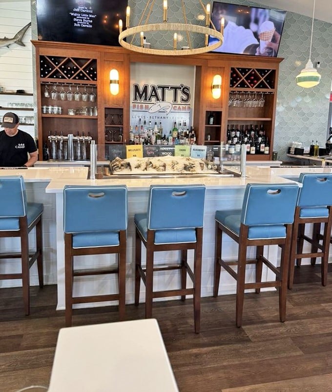 The bar at Matt's isn't just where drinks are made—it's where seafood dreams begin, with oysters on ice waiting for their moment of glory.