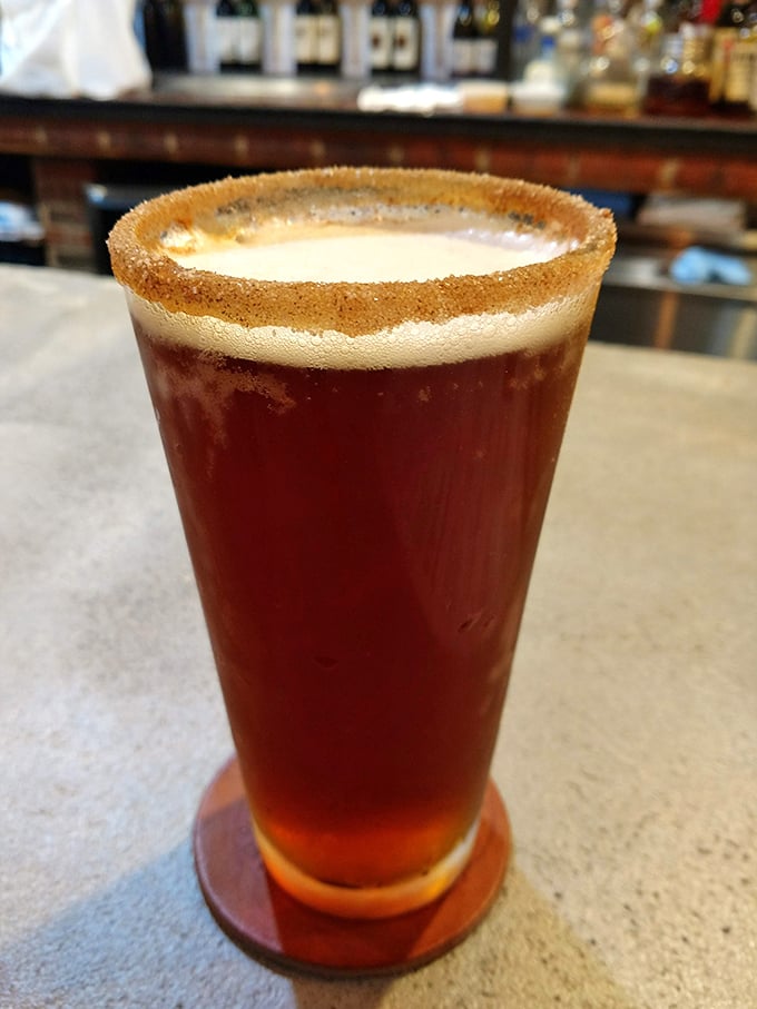 A perfectly poured beer with a graham cracker rim—because sometimes your barbecue deserves a more sophisticated drinking buddy than soda.