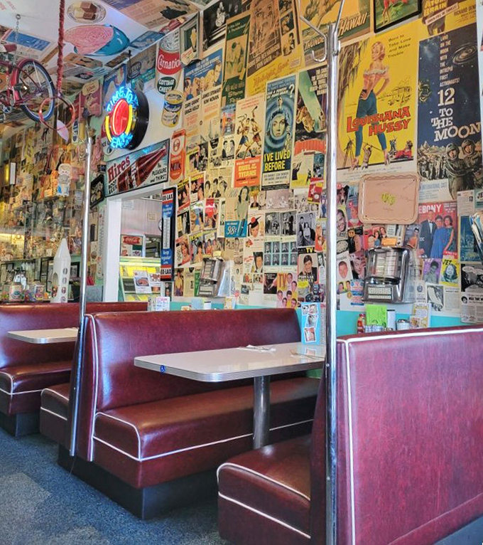 The walls aren't decorated – they're curated, a museum of mid-century Americana where every poster and pennant has earned its place over decades.