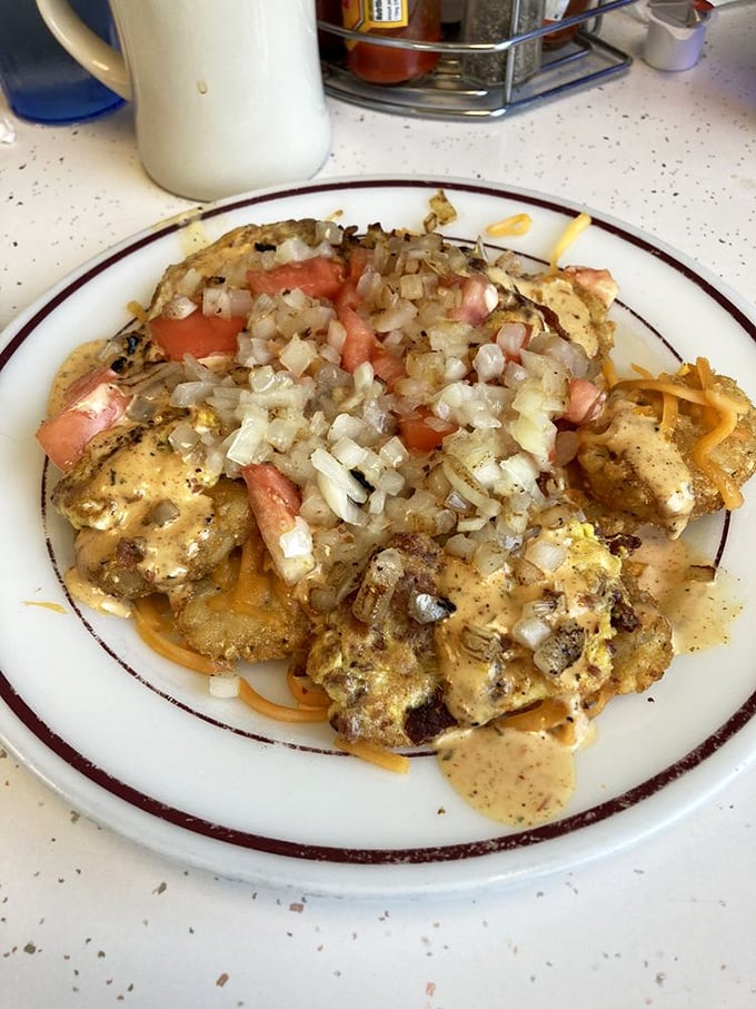 These breakfast nachos aren't trying to be authentic Mexican cuisine—they're trying to be delicious, and they're succeeding spectacularly.