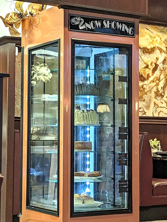 The dessert case beckons with sweet promises. "Now Showing" indeed—it's the finale your meal deserves.