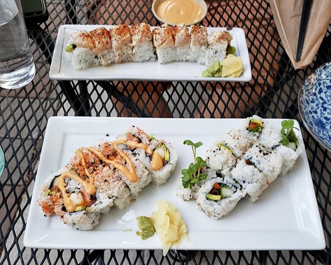 Sushi rolls arranged with such precision they could pass for art—if art was delicious enough to devour in four perfect bites.