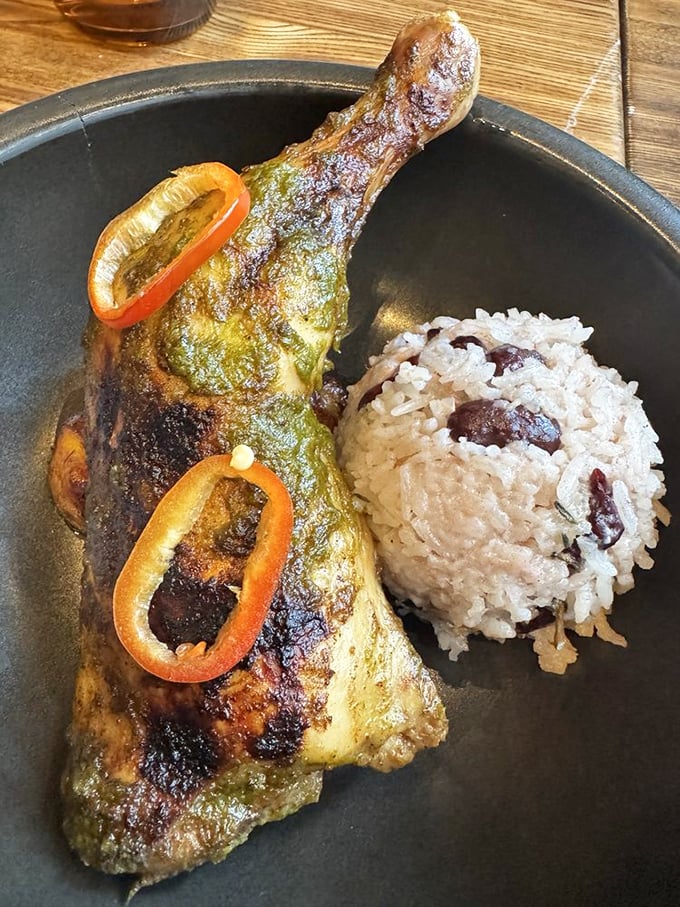 This Caribbean-spiced chicken leg with coconut rice isn't just dinner—it's a vacation for your mouth without the airfare.
