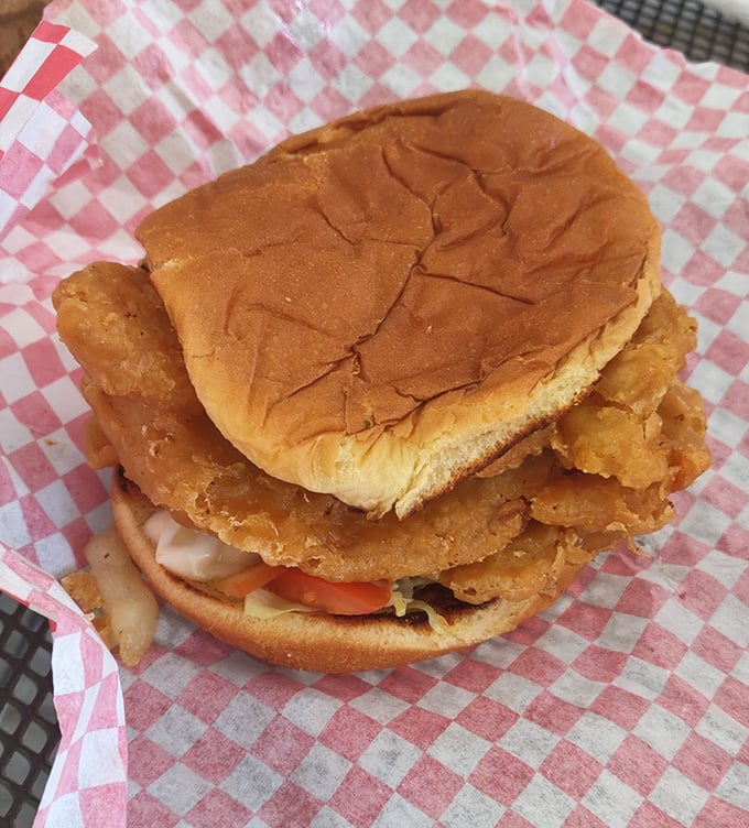The catfish tenderloin sandwich offers a seafood twist on Kitty's signature style—crispy, flaky, and substantial enough to satisfy a Missouri appetite.