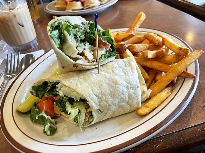 This wrap isn't just lunch—it's a portable feast of fresh greens and grilled chicken that makes desk eating feel downright civilized.