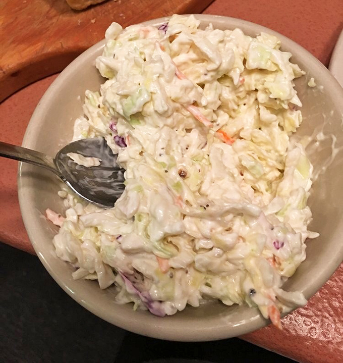 The coleslaw provides that perfect crisp counterpoint to all the warm comfort foods – a refreshing palate cleanser between bites of chicken.