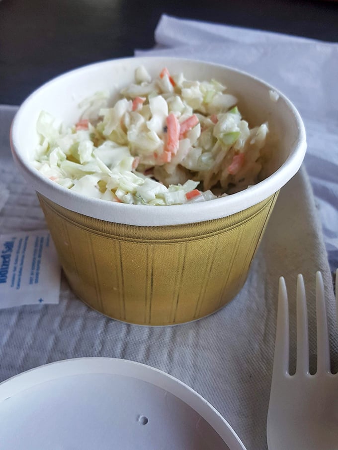 The coleslaw that knows its role—not an afterthought but the perfect tangy counterpoint to rich seafood.
