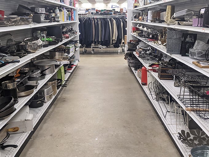 The kitchenware aisle – where forgotten pots and pans dream of simmering Sunday sauces in their next kitchen.