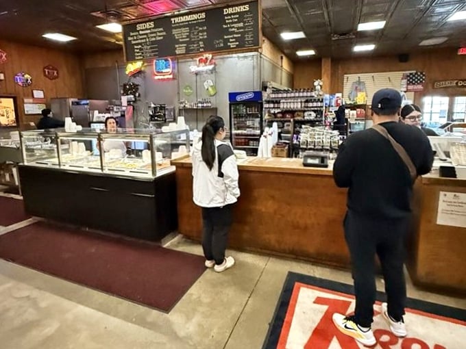 The ordering counter—where dreams are weighed by the pound and diet plans go to die a delicious death.