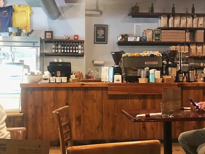 Where breakfast magic happens. The wooden counter and coffee setup create that perfect "third place" feeling—neither home nor work, just pure comfort.