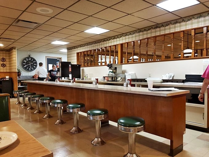 The counter where regulars have solved the world's problems over coffee for generations. Some say the best seat in the house.