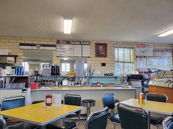 Behind this counter, ice cream alchemy happens daily. The flavor board isn't just a menu—it's a roadmap to happiness.