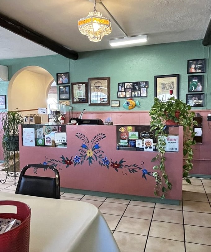 The counter area showcases decades of awards and family photos—a shrine to authenticity in an age of corporate dining.