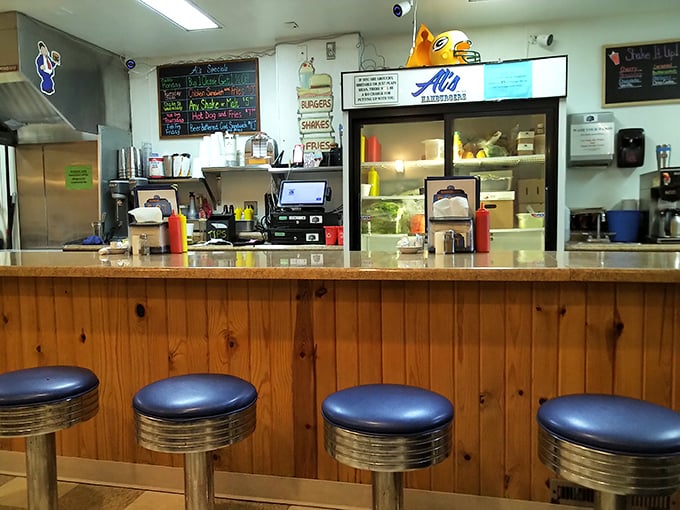 The beating heart of burger paradise—a counter where magic happens and diet plans go to die gloriously.